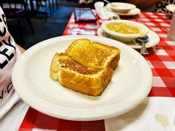 Grilled cheese elevated to an art form—the kind of simple pleasure that reminds you why some classics never need reinvention, just proper execution.