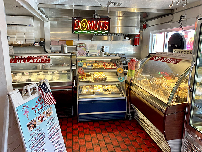 The neon "DONUTS" sign glows like a beacon of hope in a world that sometimes forgets the importance of fried dough.