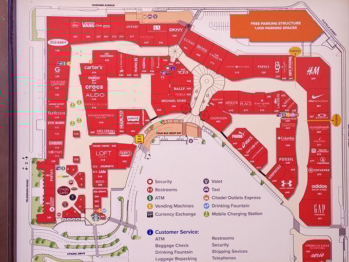 The sacred text of savings—a mall map that guides the uninitiated through the labyrinth of discounted designer dreams.