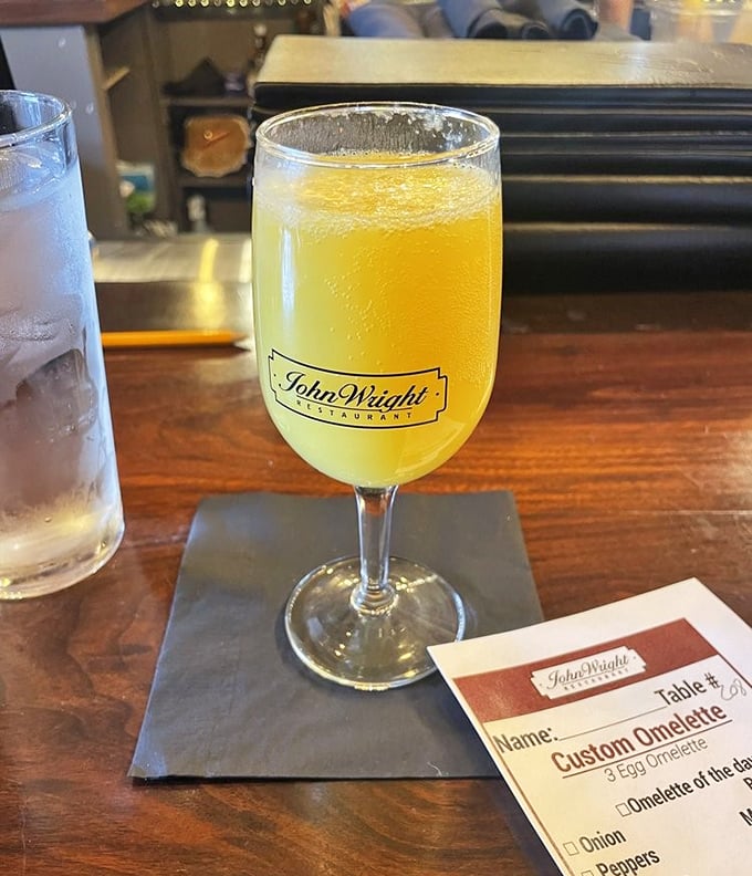 Sunshine in a glass! This mimosa isn't just a brunch accessory – it's practically mandatory riverside drinking.
