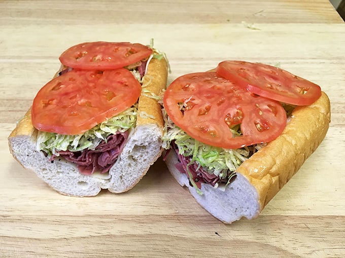 The pastrami sandwich that launched a thousand road trips, with layers that deserve their own geological survey.