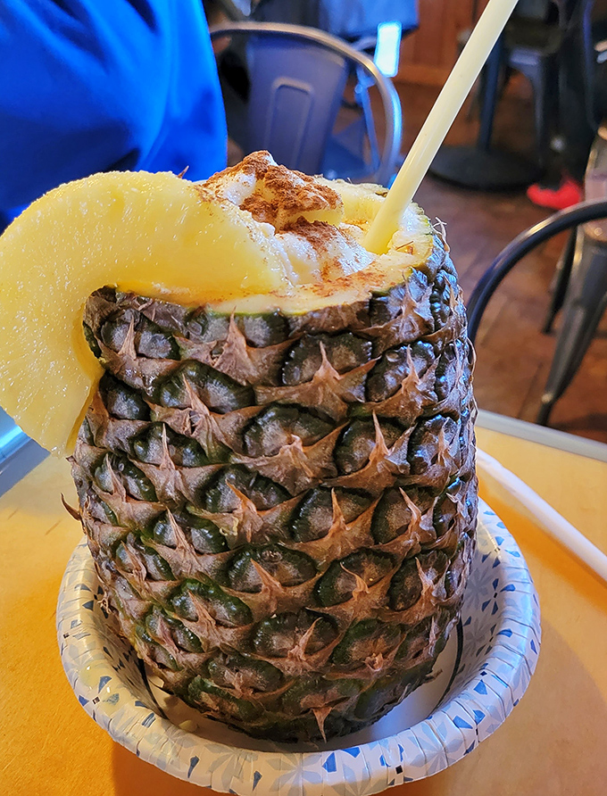 Not just a drink—a vacation in a pineapple, complete with cinnamon sprinkles and a straw that leads to tropical bliss.
