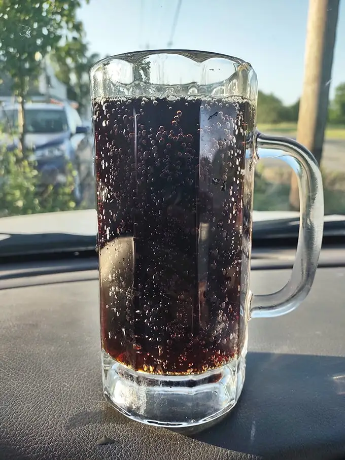 This isn't just root beer—it's liquid nostalgia in a frosty mug, with bubbles that dance like memories of summers past.