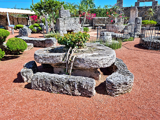 A stone table and benches arranged in perfect harmony. Dinner party for eight, anyone? Just bring your own cushions—trust me.