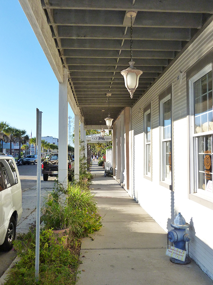 Covered walkways shield shoppers from Florida's sunshine, creating the perfect backdrop for an afternoon of boutique browsing and people-watching.