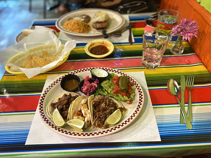 Tacos that tell a story with each bite—the perfect trilogy of tender meat, fresh toppings, and handmade tortillas that would make your abuela proud.