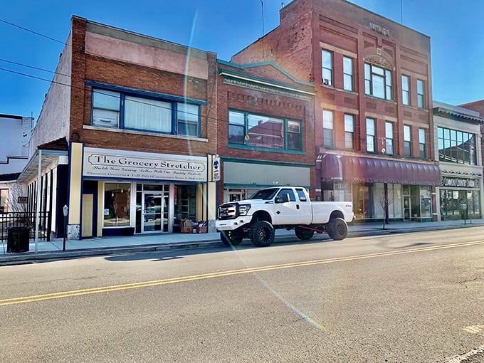 The Grocery Stretcher and neighboring shops maintain Bradford's architectural heritage while serving today's needs – history with a practical purpose.
