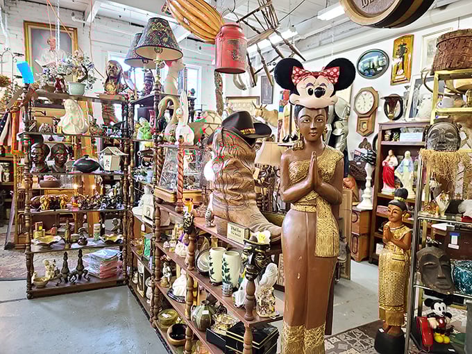 Where spiritual artifacts meet pop culture icons—Mickey Mouse keeping company with Buddha statues in a delightful cross-cultural conversation across time.
