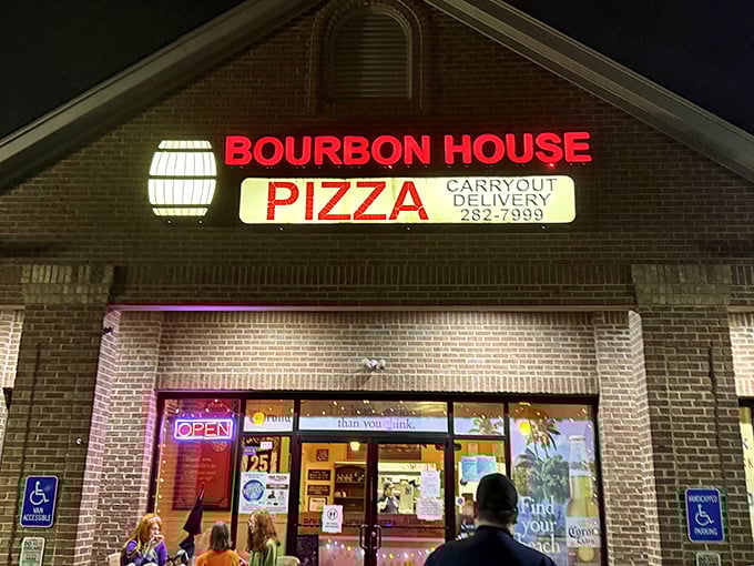 When that red sign glows after dark, it's like a pizza lighthouse guiding hungry souls to safety.