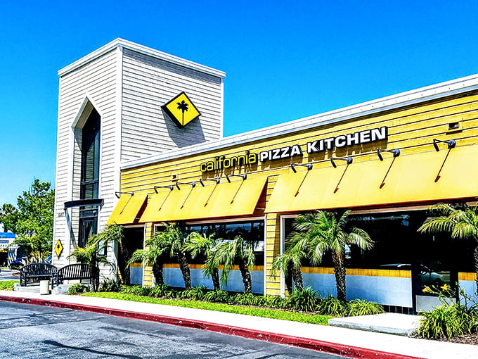 California Pizza Kitchen's sunny yellow exterior matches the Golden State freshness inside. Chain restaurant? More like charm restaurant!