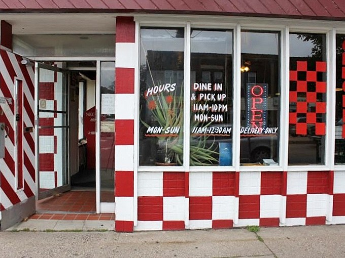 Checker Board Pizza: The bold red and white checkerboard exterior isn't just eye-catching—it's practically hypnotic in its pizza-promising power.