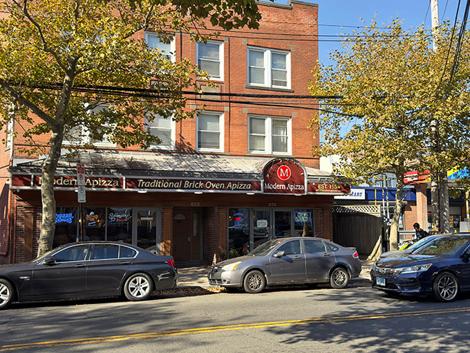 Modern Apizza: That giant metal pizza slice sculpture isn't subtle—but neither is the flavor bomb waiting inside this New Haven landmark.