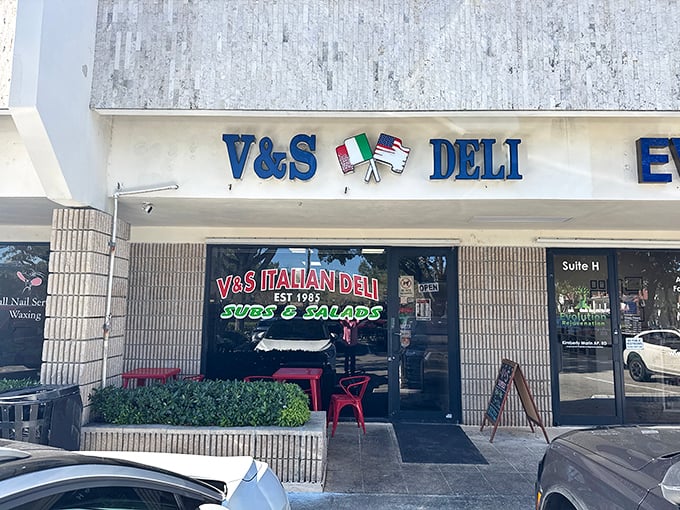 V&S Italian Deli's facade brings a slice of Italy to Boca Raton – those red tables have witnessed countless sandwich love affairs.