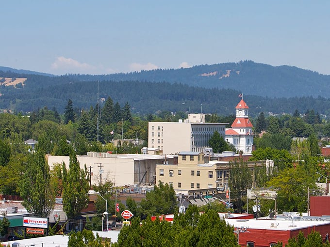 Sun-drenched buildings nestled among evergreens. Corvallis offers natural beauty and urban amenities without the premium price tag of larger Oregon cities.