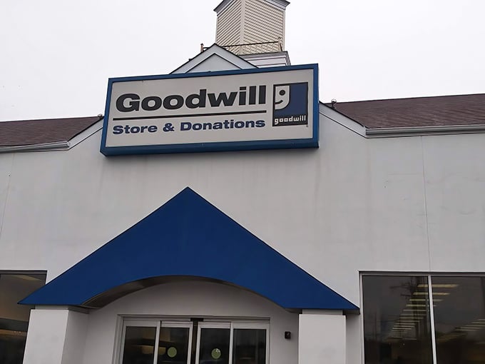 The blue awning welcomes you like an old friend saying, "Come on in, the bargains are fine!"