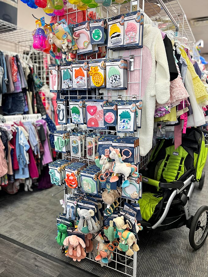 Colorful baby accessories hang like ornaments on a tree of childhood treasures. Cuteness overload at budget-friendly prices!