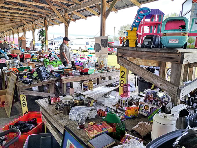 The outdoor market experience in all its glory—tables of possibilities under Florida skies and covered walkways.