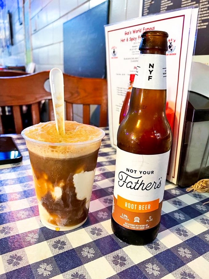 A root beer float and craft bottle—because sometimes you need something sweet and nostalgic to tame that spicy chicken heat.