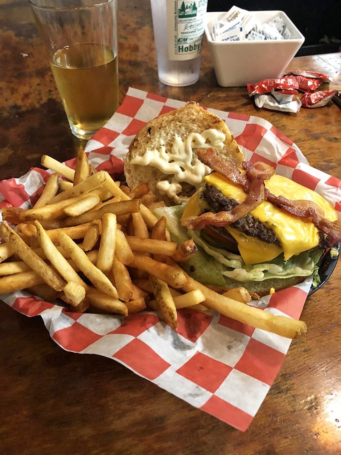 When a burger loves bacon and cheese this much, you don't question it—you just grab extra napkins and prepare for joy.