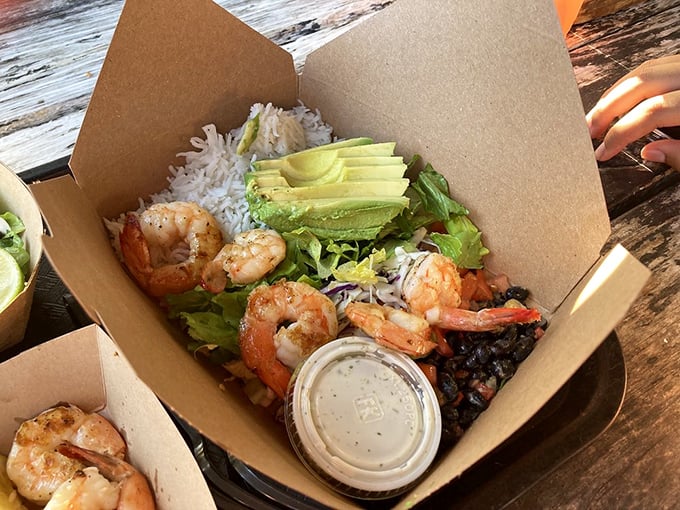 The Baja Box isn't just lunch—it's a vacation in a container. Grilled shrimp, fresh avocado, and rice playing together like old friends at the beach.