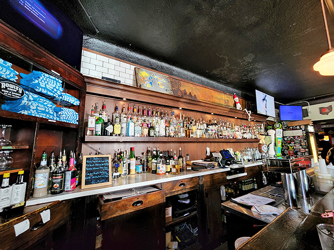 Behind every great neighborhood bar is a wall of bottles containing liquid courage, celebration, and occasionally regrettable decisions.