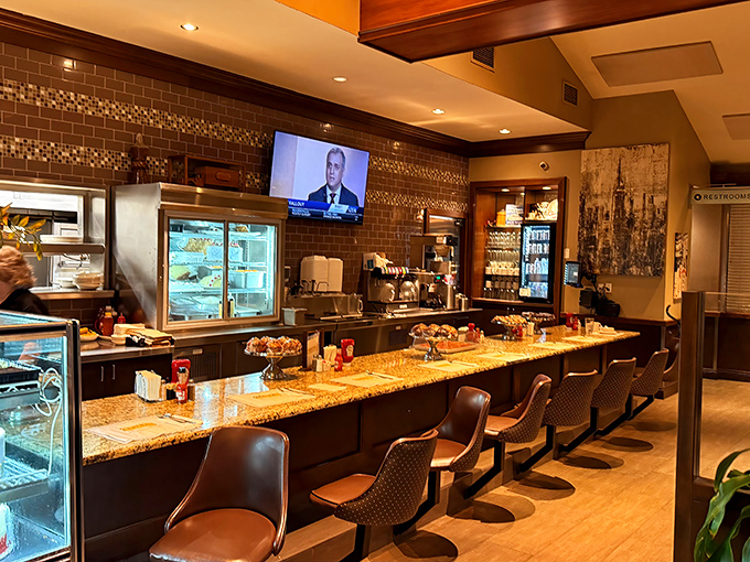The counter seats—where solo diners become regulars, and regulars become family. That marble countertop has heard more stories than a bartender.