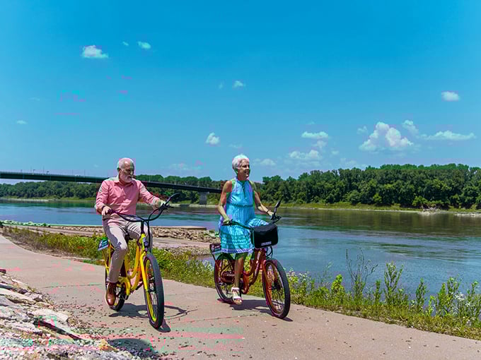 Cycling along the Missouri River—where "exercise" meets "vacation" and nobody has to compromise. These riders have discovered the secret to enjoying scenery without windshield interference.