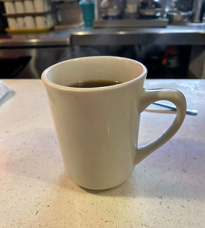 Sometimes the simplest pleasures speak loudest. A sturdy mug of black coffee—the unsung hero of every great breakfast.