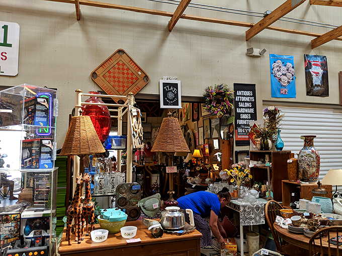 Lamps, furniture, and curiosities create a three-dimensional Pinterest board of vintage charm. That checkerboard might have witnessed Bobby Fischer's early moves.