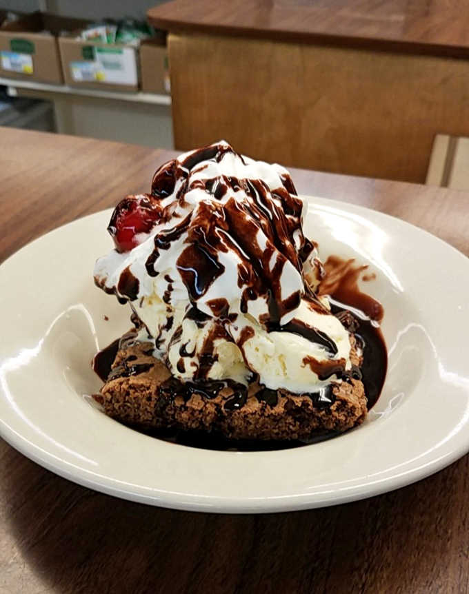 A brownie sundae that doesn't just satisfy your sweet tooth—it throws a party for it. Ice cream melting into warm chocolate is nature's perfect symphony.