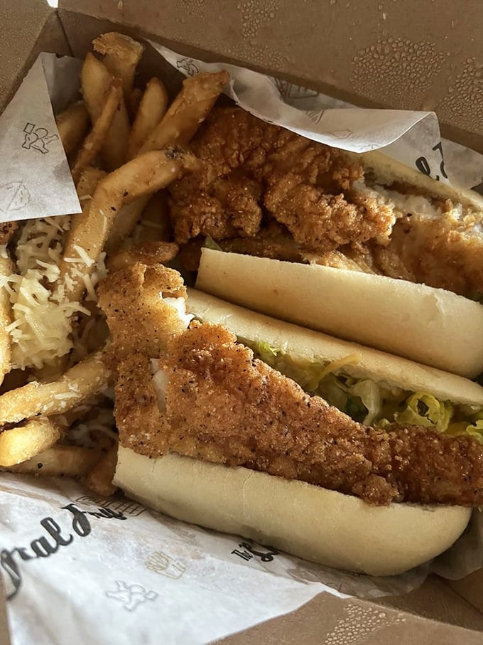 The catfish po' boy that could make New Orleans jealous. Crispy fish, fresh toppings, and fries on the side—Southern comfort with Baltimore attitude.