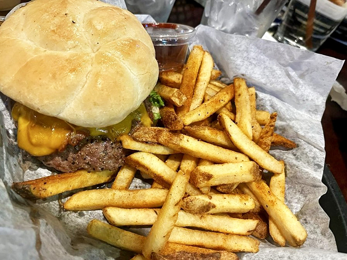 This burger isn't messing around. Look at that cheese melt! It's the kind of sandwich that makes vegetarians have second thoughts.