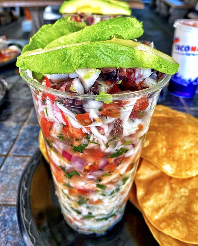 Fresh ceviche served tall and proud - citrus-cured perfection that tastes like sunshine captured in a glass.