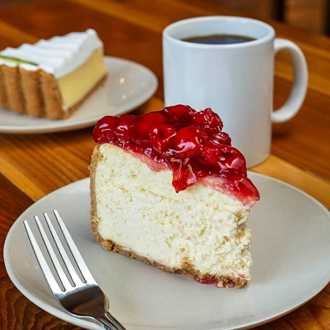 New York cheesecake topped with ruby-red cherries – a dessert so classic it's like the Frank Sinatra of the pastry world.