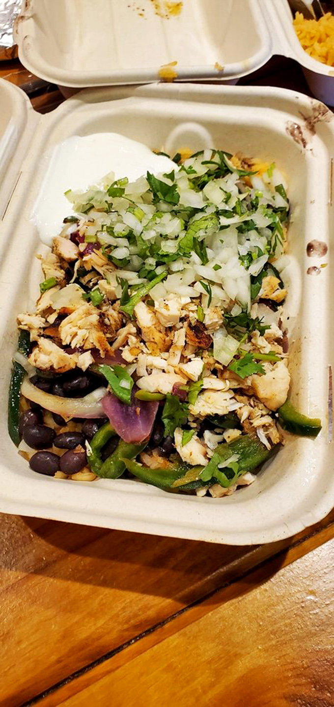 A fiesta in a bowl—chicken, peppers, beans, and fresh herbs creating a colorful tableau that's almost too pretty to eat. Almost.