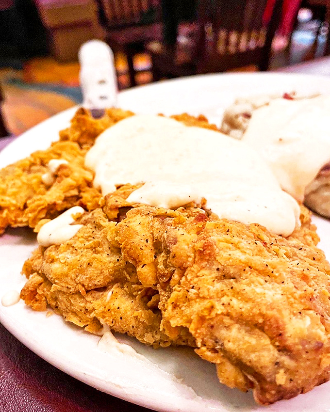 Chicken fried steak with country gravy—Southern comfort food that hugs your insides like a warm blanket on a rainy day.