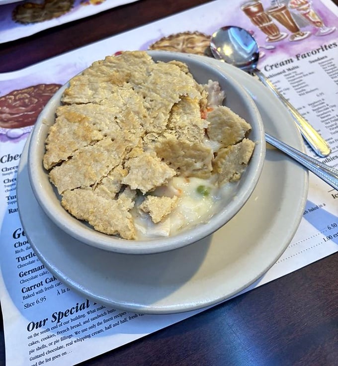 Beneath that golden crust lies the solution to most of life's problems. This chicken pot pie doesn't need fancy ingredients—just the power to make everything better.