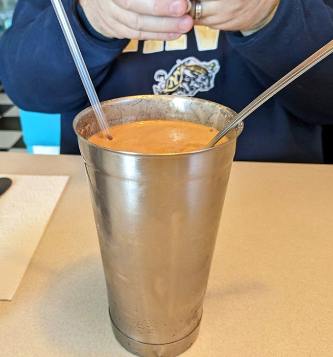 This chocolate milkshake isn't just thick – it's plotting to overthrow all other desserts with its cold, creamy deliciousness. Two straws required.