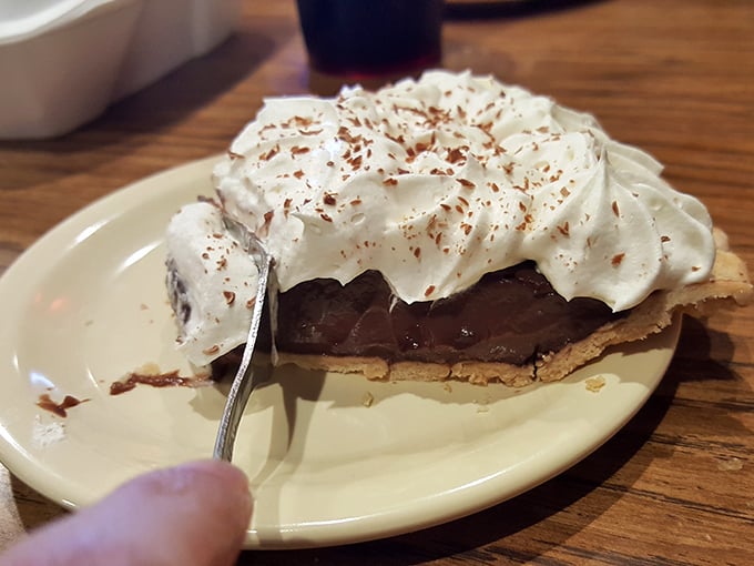 This chocolate cream pie doesn't just satisfy a sweet tooth—it creates a religious experience that could convert even the most dedicated diet enthusiast.
