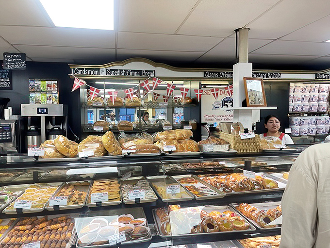 The pastry counter at Olsen's is like Disneyland for adults—magical, exciting, and guaranteed to make you act like an overjoyed child.