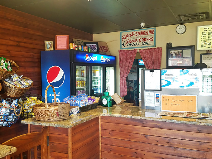Behind this counter, magic happens with methodical precision—no fancy equipment, just decades of hot dog craftsmanship at work.