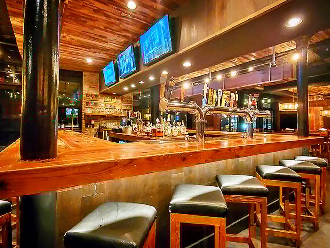 The bar at The Eagle—where bourbon dreams come true and strangers become friends over shared appreciation of properly made Old Fashioneds.