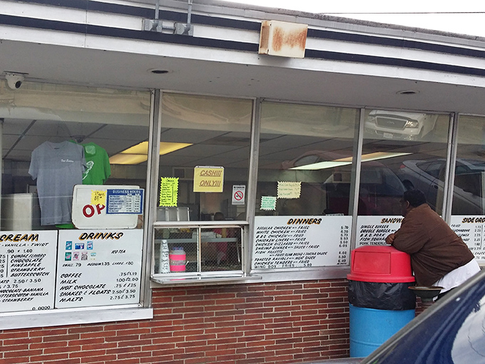 The order window—where dreams are placed and cardboard boxes of happiness are handed back in return.