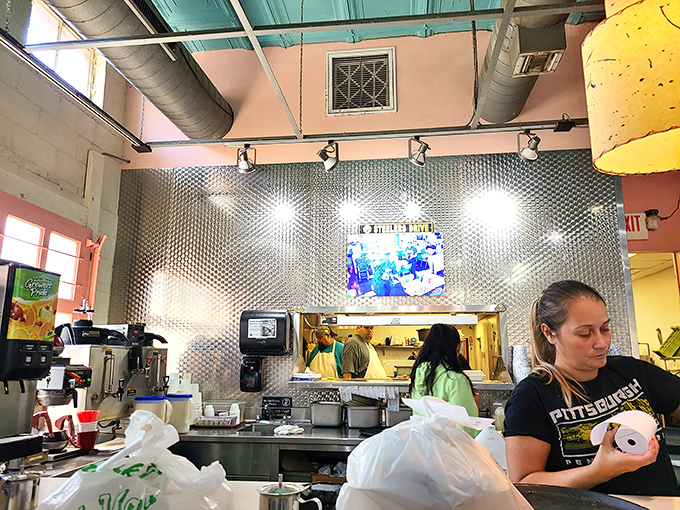 Behind that stainless steel counter, breakfast magic happens with the precision of a Swiss watch and the soul of Pittsburgh.