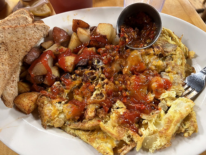 An omelet should be a perfect marriage of ingredients, and this one looks like it's celebrating its golden anniversary.