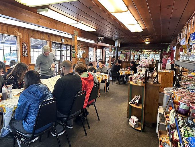 Where strangers become temporary friends. The dining room buzzes with conversation as mountain tales and food recommendations flow freely.