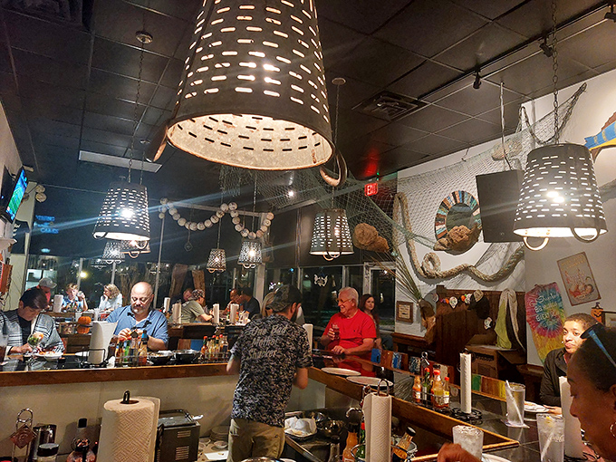 The bar's buzzing energy is contagious—where strangers become friends over shared oyster recommendations and seafood epiphanies.