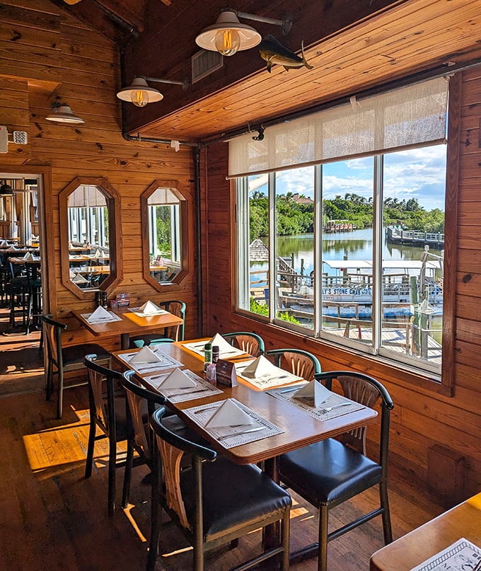 Wooden walls, water views, and tables set for seafood feasts—this isn't just dining, it's the Florida experience distilled to its essence.
