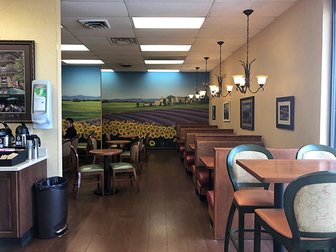 The dining area offers a calm retreat from shopping, with warm wood tones and a mural that whispers, "Stay awhile."