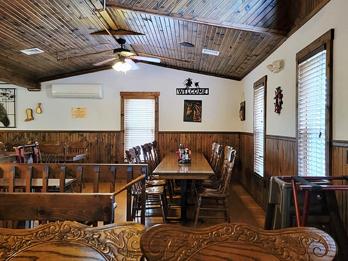 The dining area strikes that perfect balance between "rustic charm" and "I can actually hear my dinner companions." Wood paneling for days!